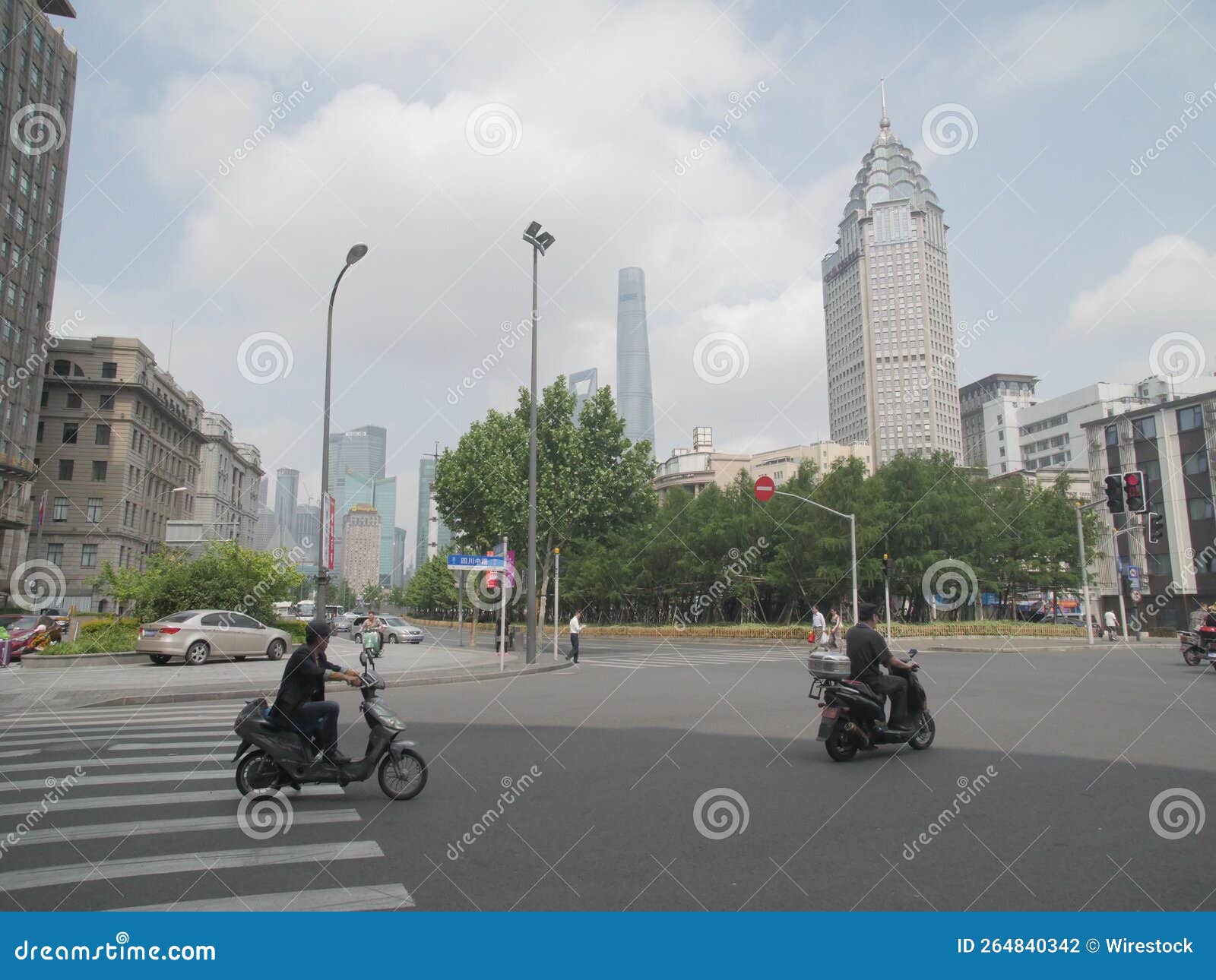 Scooters Pulling into Intersection in Shanghai, China. Editorial ...
