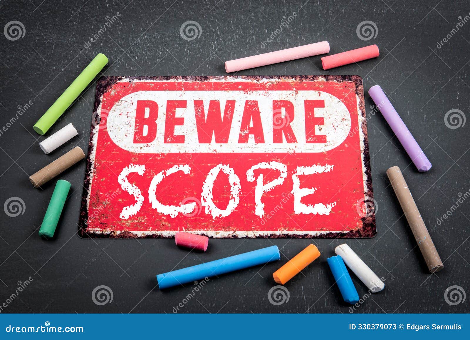 SCOPE. Beware Sign with Text and Colored Pieces of Chalk on a Dark ...