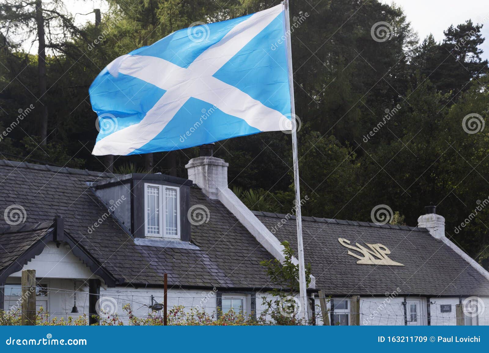 Scottish Flag Flying in Arran Editorial Stock Image - Image of scotland ...