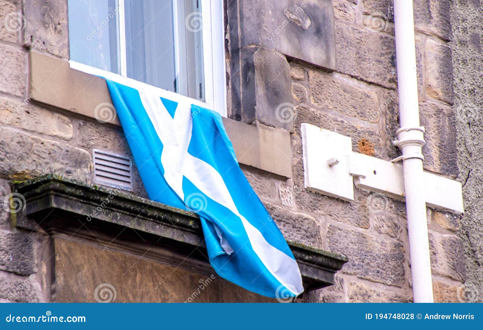 Scottish Flag Flying stock photo. Image of scotland - 194748028