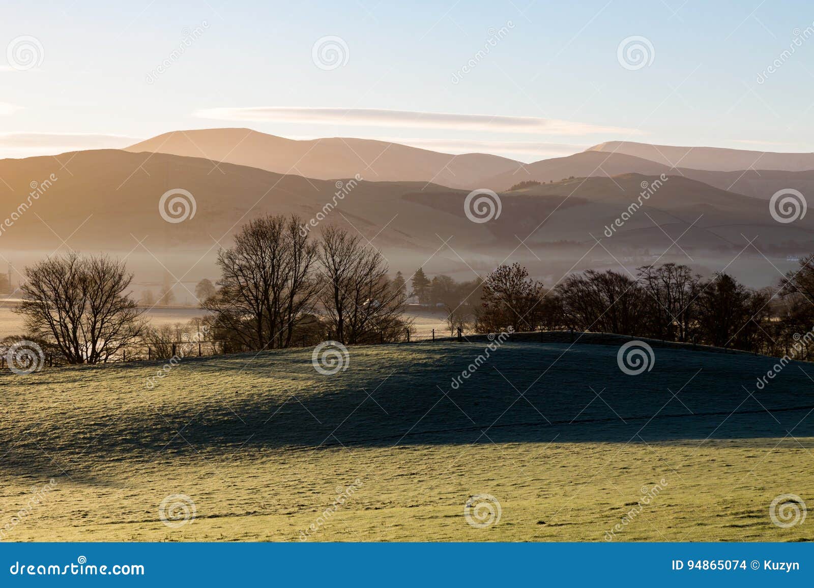 Scottish Highlands in Sunrise Light with Fog in Middle Stock Photo ...