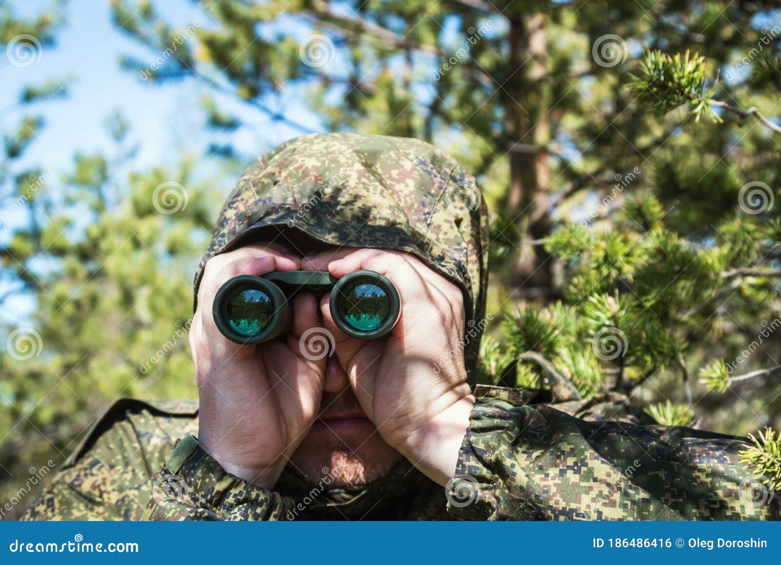 Scout Looking through Binoculars in the Forest Stock Photo - Image of ...