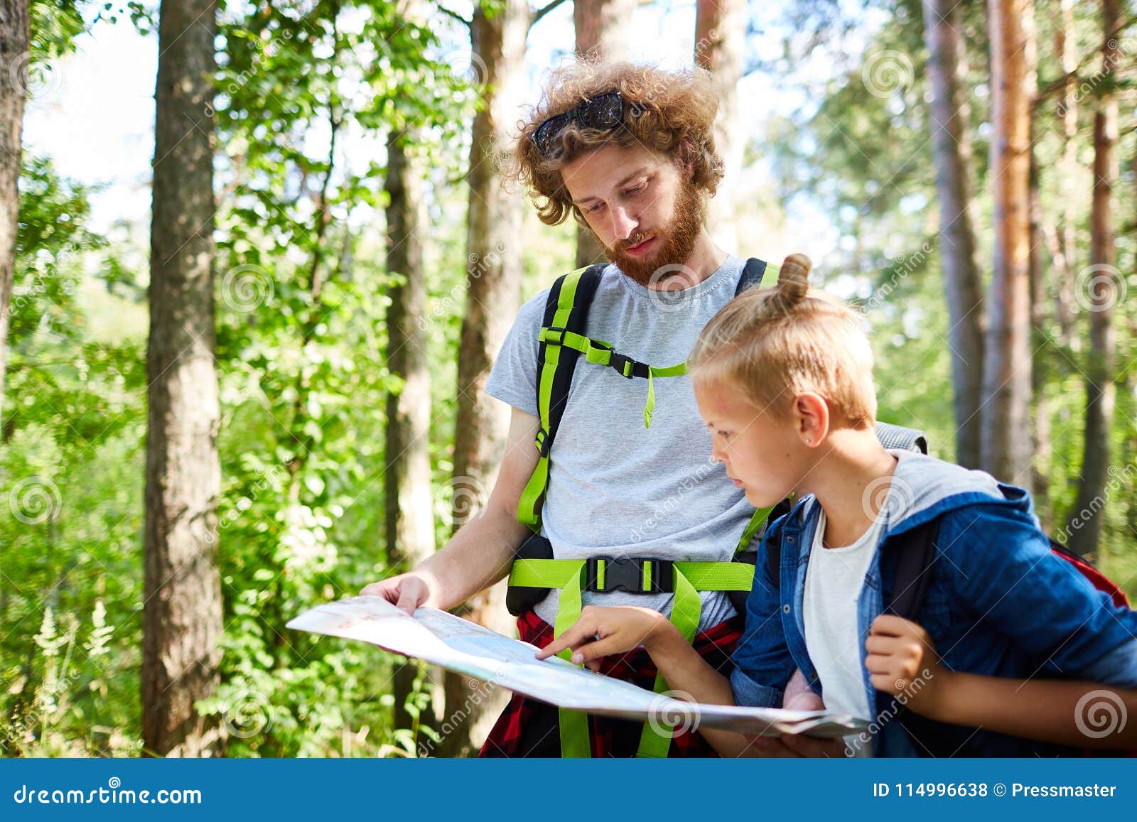Scouts with map stock photo. Image of backpack, camper - 114996638
