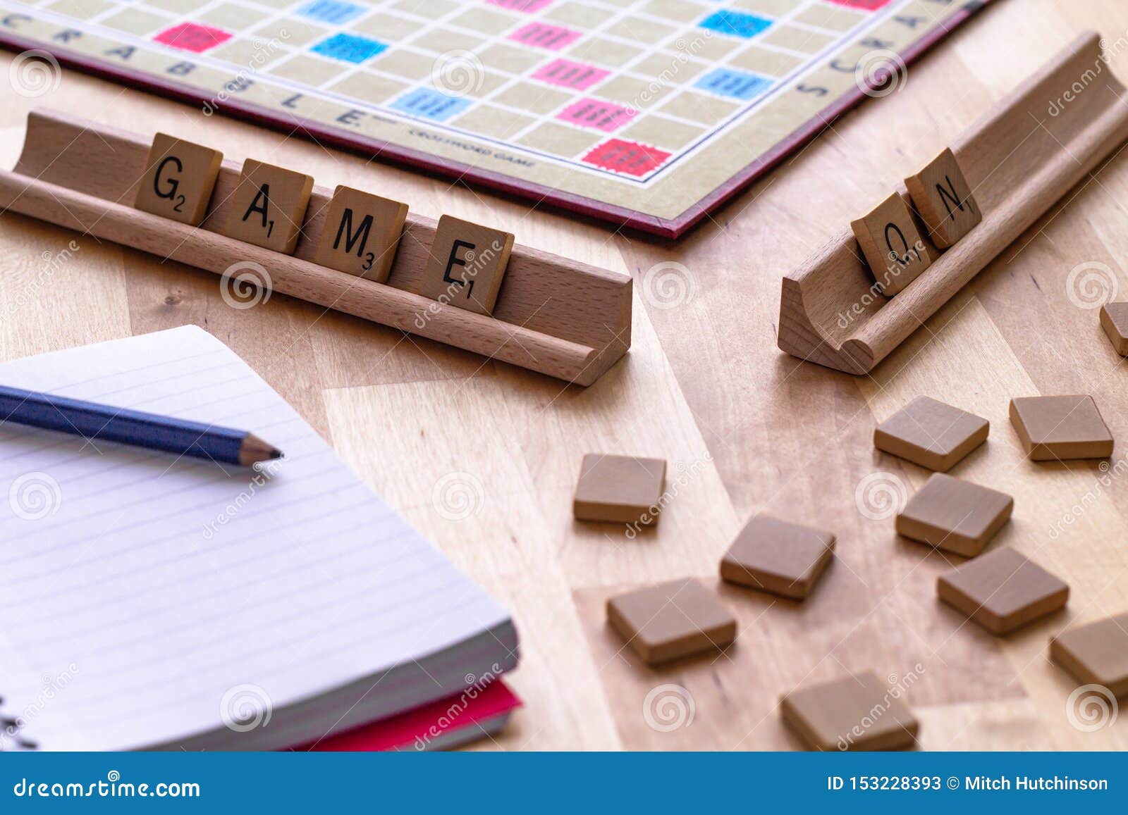 Scrabble Board Game with the Scrabble Tile Spell `Game on` Editorial ...