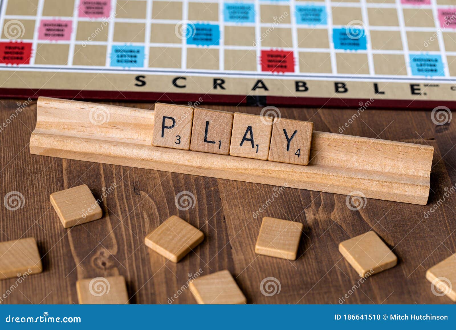 Scrabble Board Game With The Scrabble Tile Spelling `Play` Editorial ...