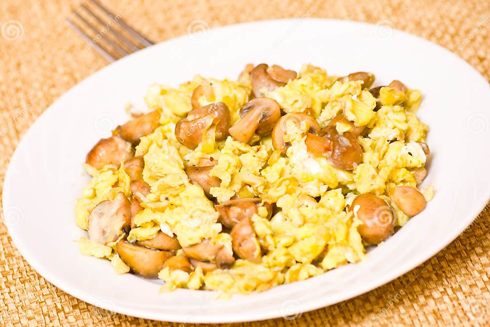 Scrambled Eggs with Mushrooms Stock Image - Image of dispenser, fork ...