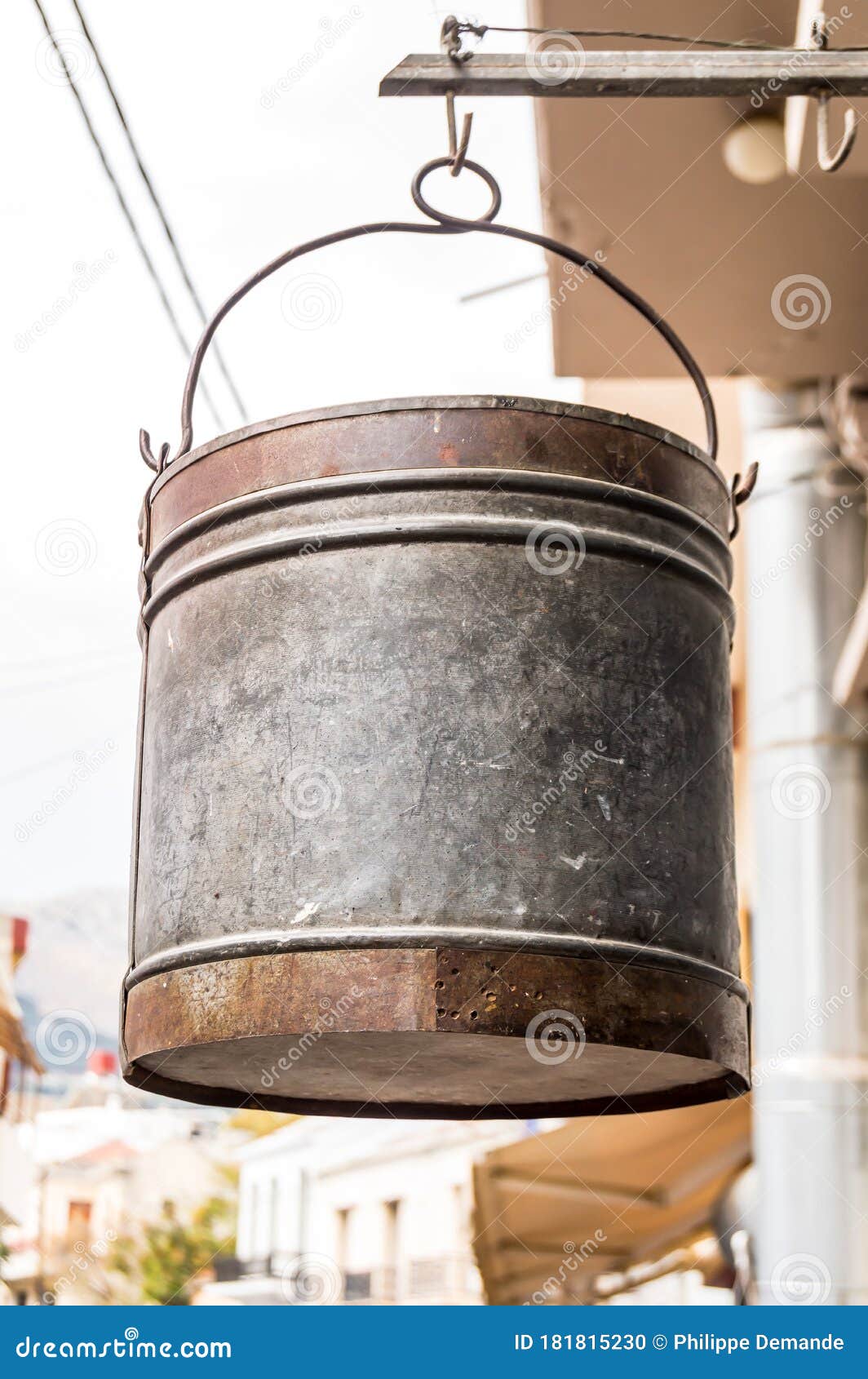 Scrap Bucket Hanging Outside Stock Photo - Image of fashioned, clean ...