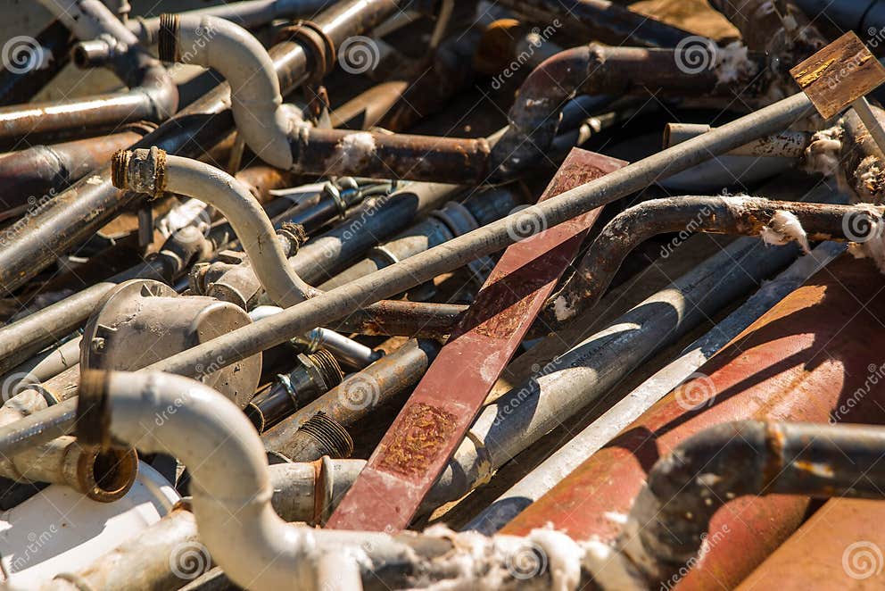 Scrap metal in a container stock photo. Image of iron - 293250492