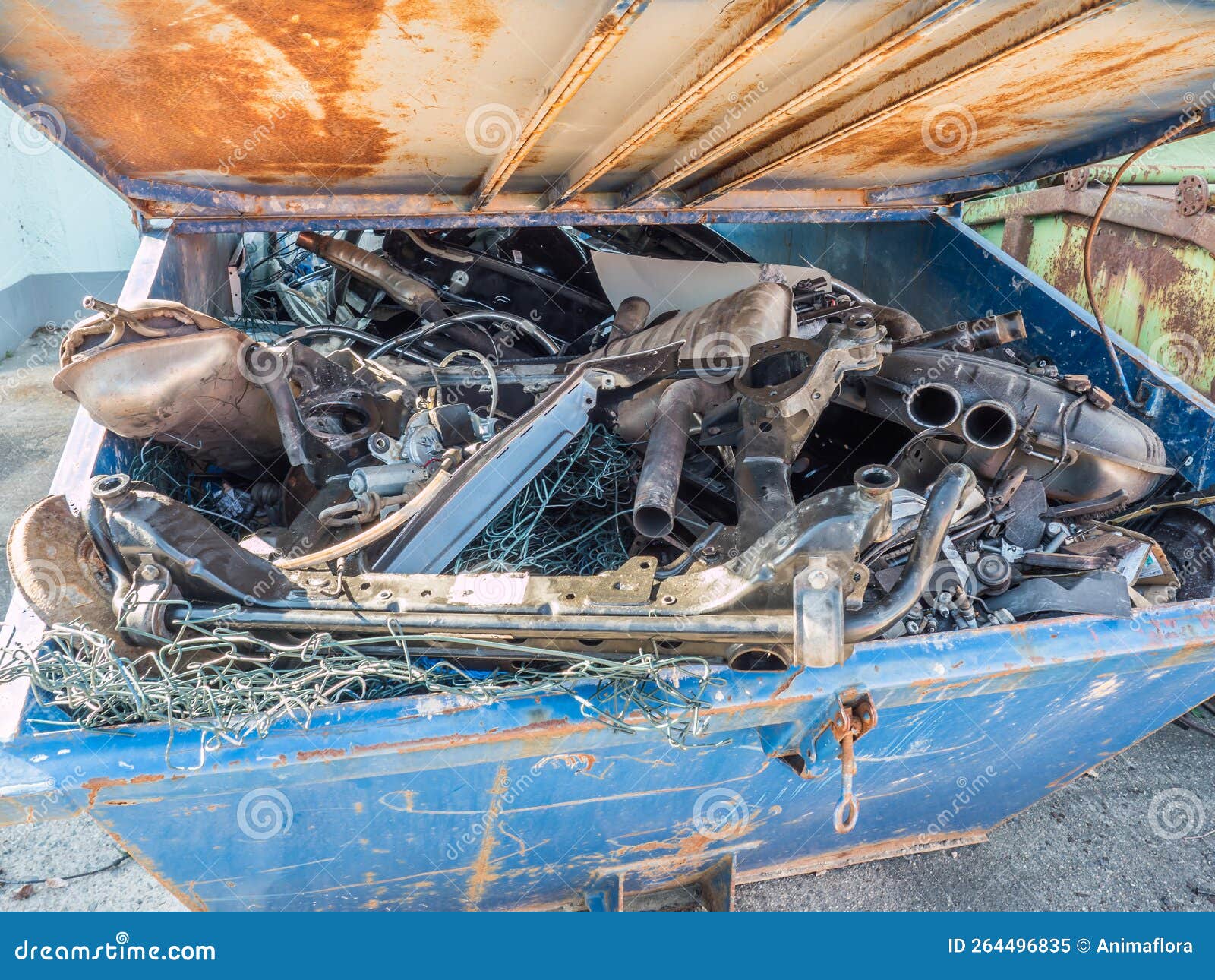 Scrap metal in a container stock image. Image of dirty - 264496835