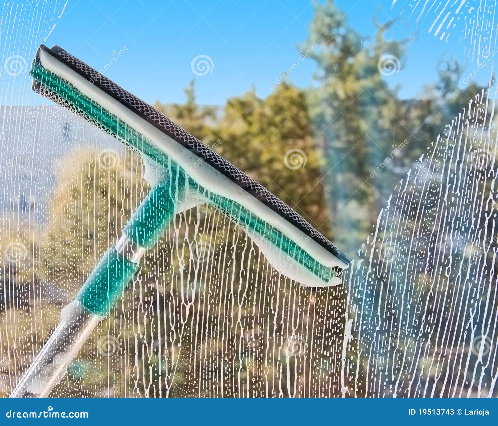 Scraper cleans the window stock image. Image of cleaning - 19513743