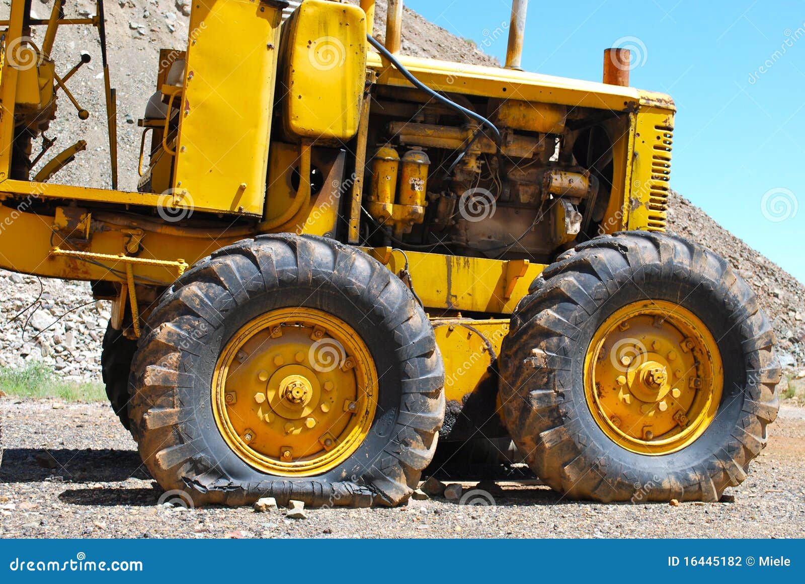 The Scraper and the Flat Tire Stock Photo - Image of remove, safety ...