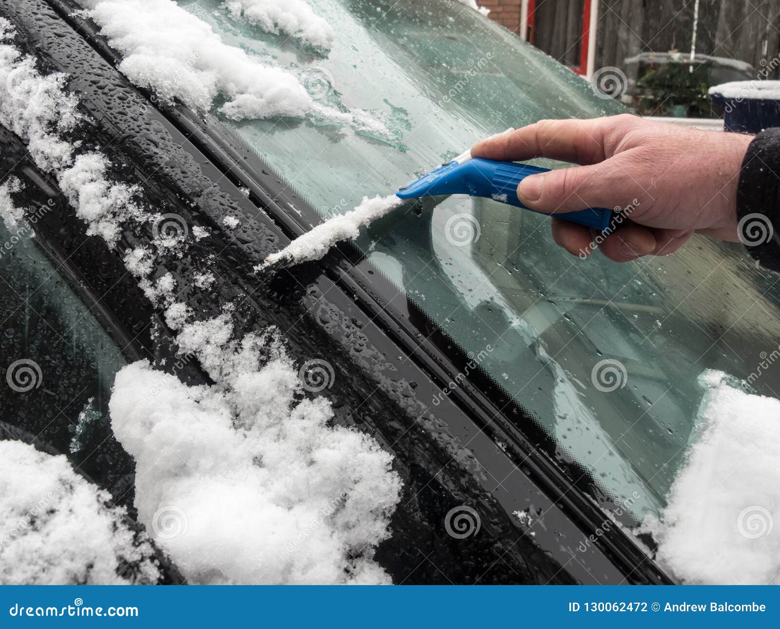 Scraping Ice of Car Windscreen on Winter Day Stock Photo - Image of ...