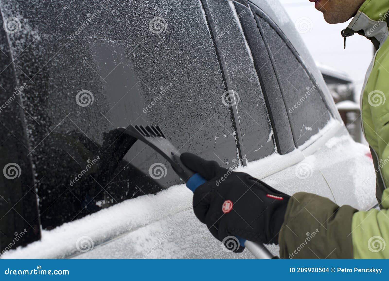 Scraping ice from car stock photo. Image of freeze, auto - 209920504