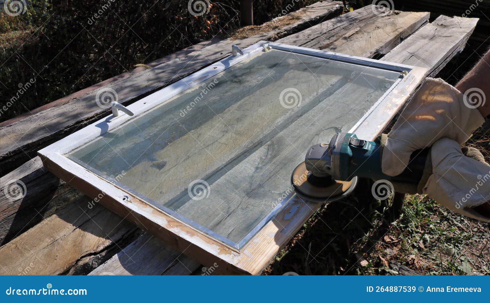 Scraping Paint from a Wooden Window Frame with a Grinder Stock Image ...