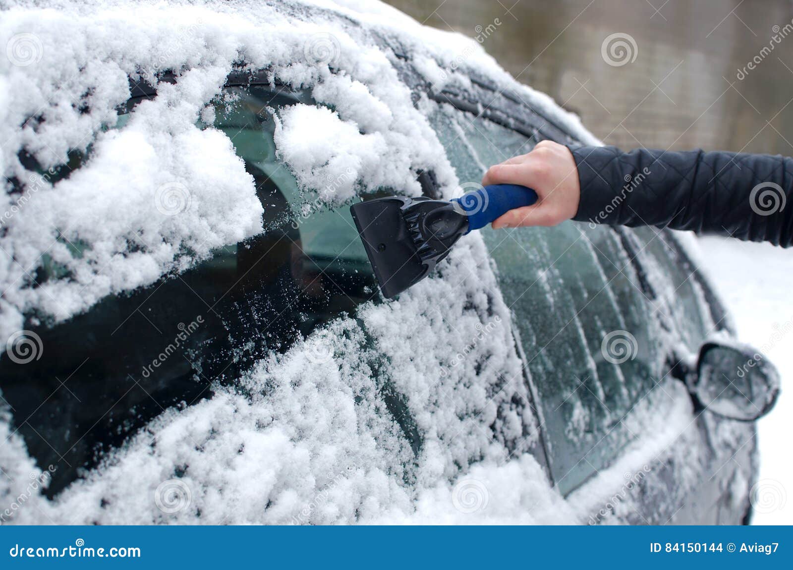 Scraping Snow from the Car Window Stock Photo - Image of snowflake ...