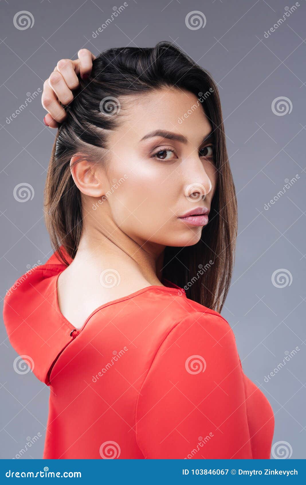 Serious Young Woman Scratching Her Head while Standing Thoughtfully ... Serious Young Woman Scratching Her Head while Standing Thoughtfully ...