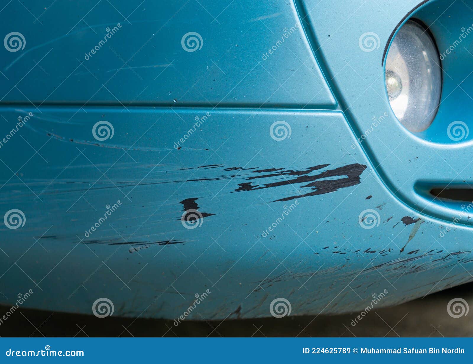Scratch On A Bumper Of A Blue Car On A Public Parking. Not A Rare Scene ...