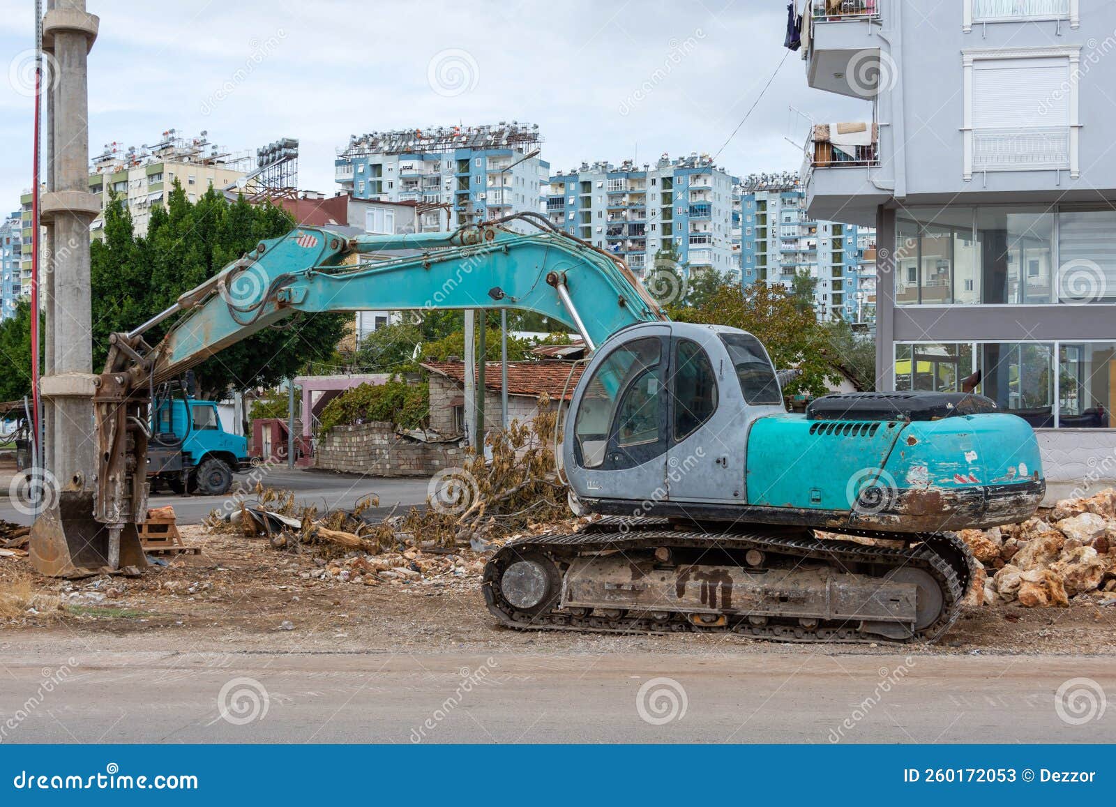 The Blue Excavator Has Black Smoke Produced By Incomplete Combustion ...