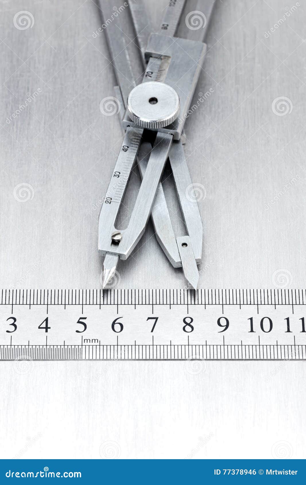 Scratched Metal Background With Proportional Divider And Standard Ruler ...