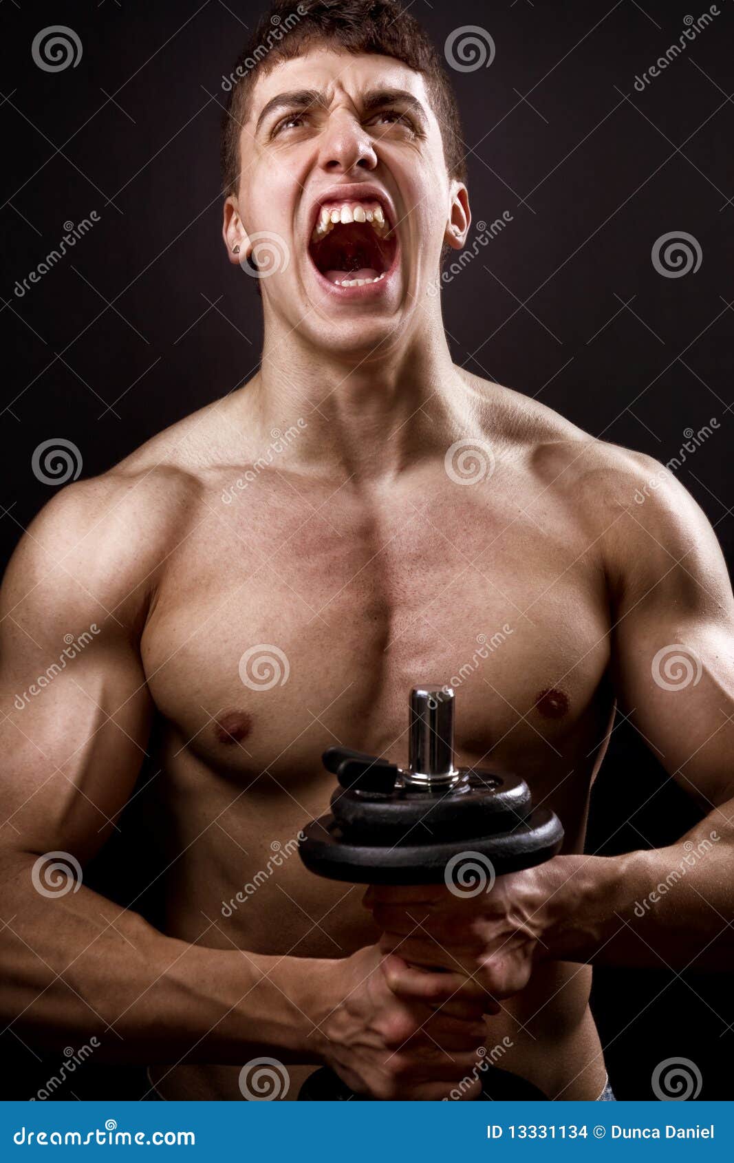 Muscular Bodybuilder Flexing Biceps Stock Photo | CartoonDealer.com ...