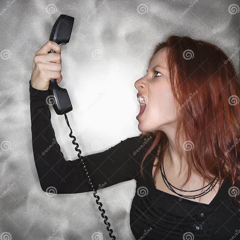Screaming into telephone. stock photo. Image of hair, phone - 3469726
