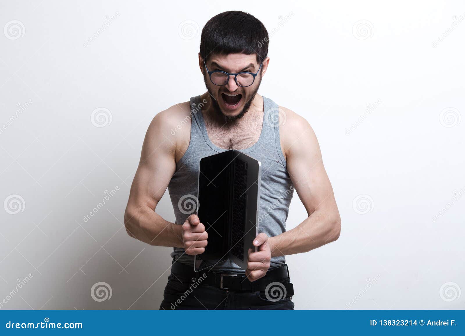 Screaming Young Man Opening Laptop Over White Studio Background Stock ...