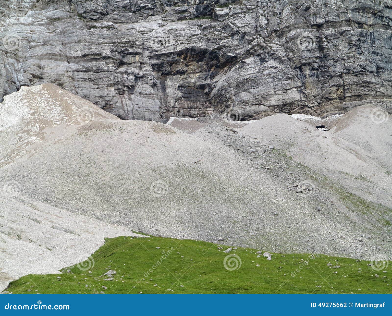Scree slopes at rock wall stock photo. Image of debris - 49275662