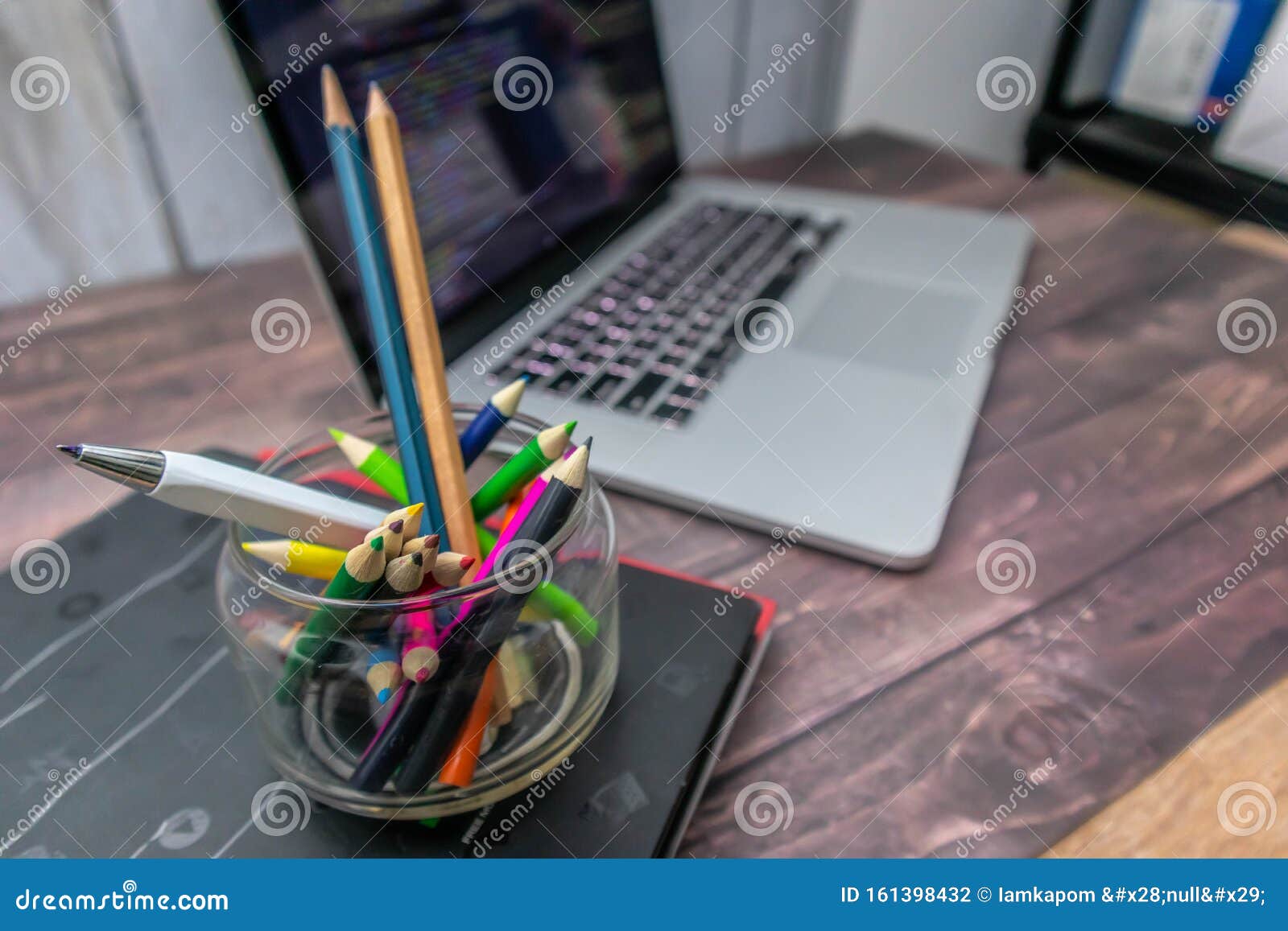 The Screen of the Program Source Code on the Laptop Placed on the Desk ...