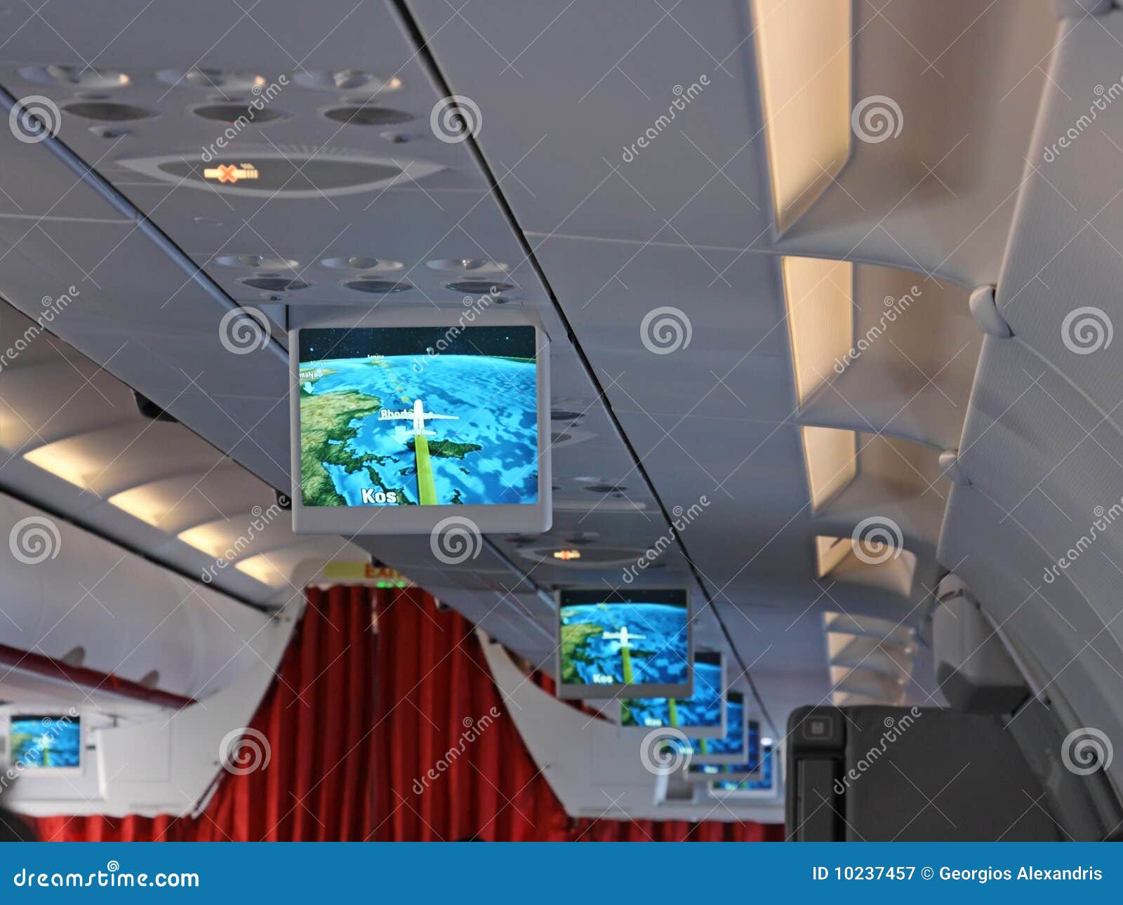 Screens in an Airplane stock image. Image of lights, passenger - 10237457