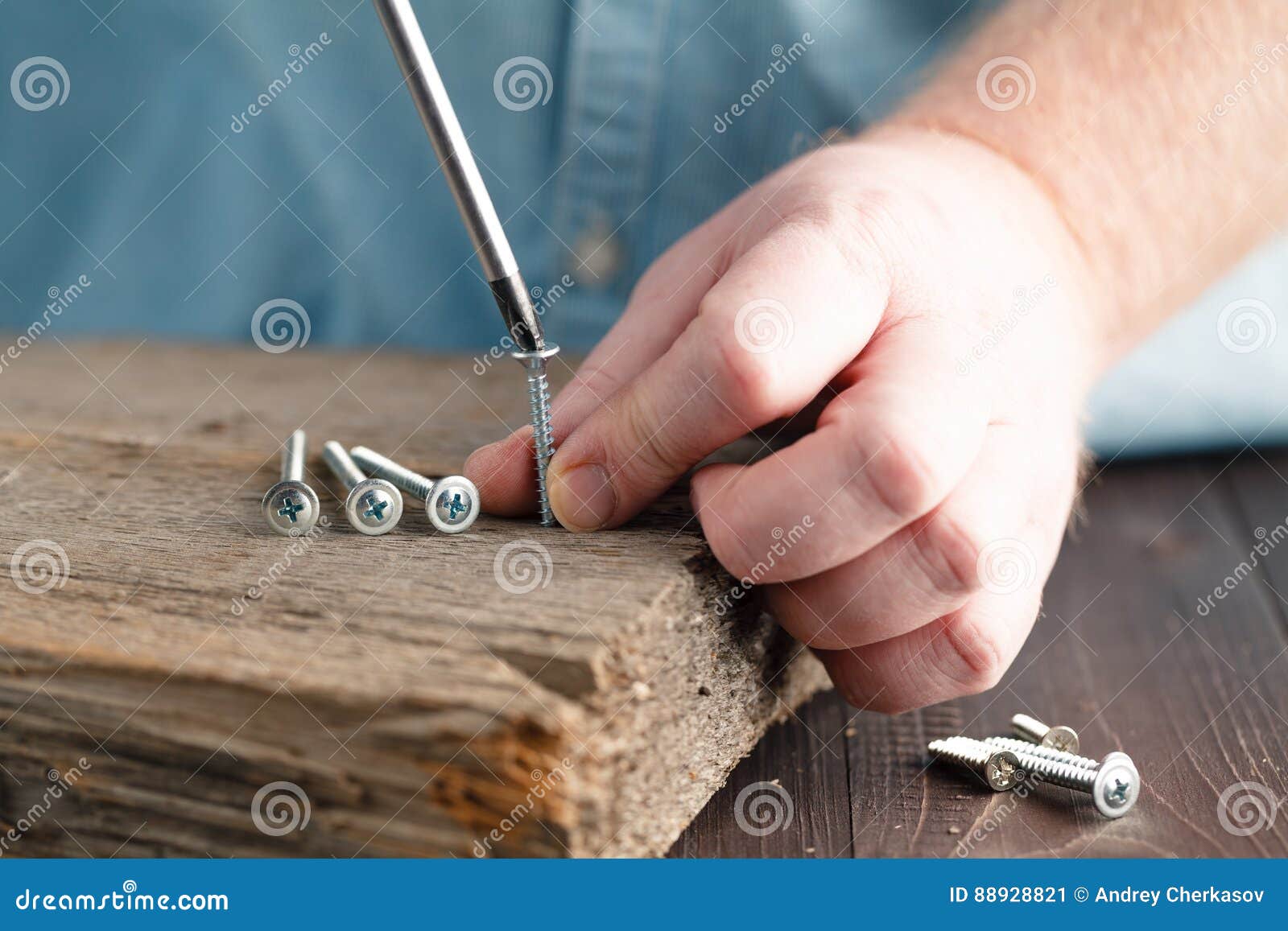 Being Screwed into a Piece of Wood Stock Image - Image of installing ...