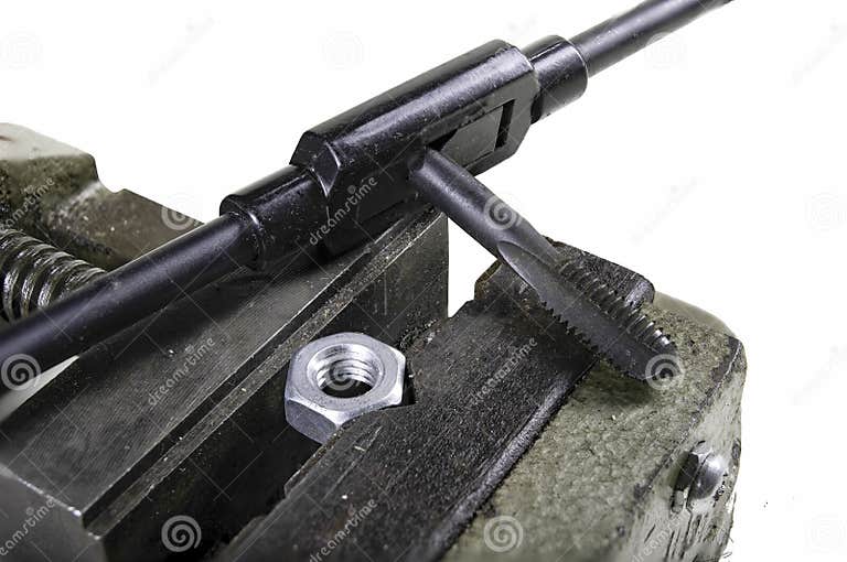 The Nut in a Vice while Cutting a Mechanical Thread. Minor Locksmith ...