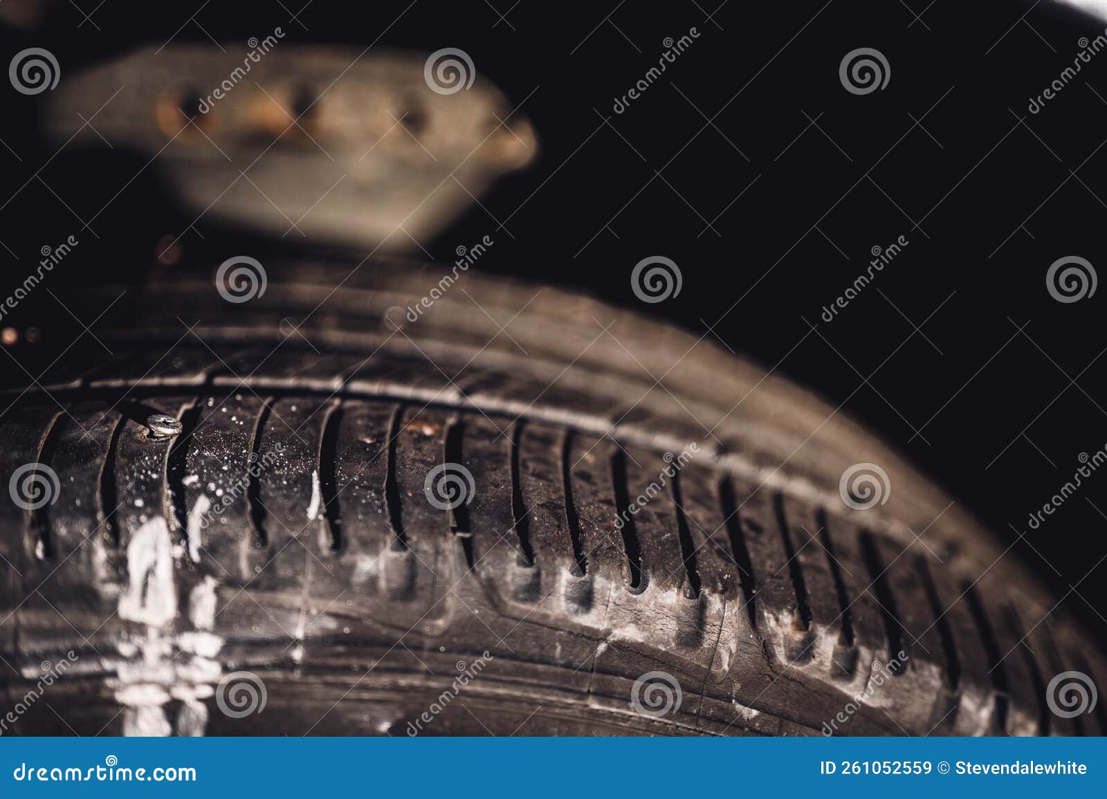 Protruding from the Tread of a Tire Causing a Flat. Stock Image - Image ...