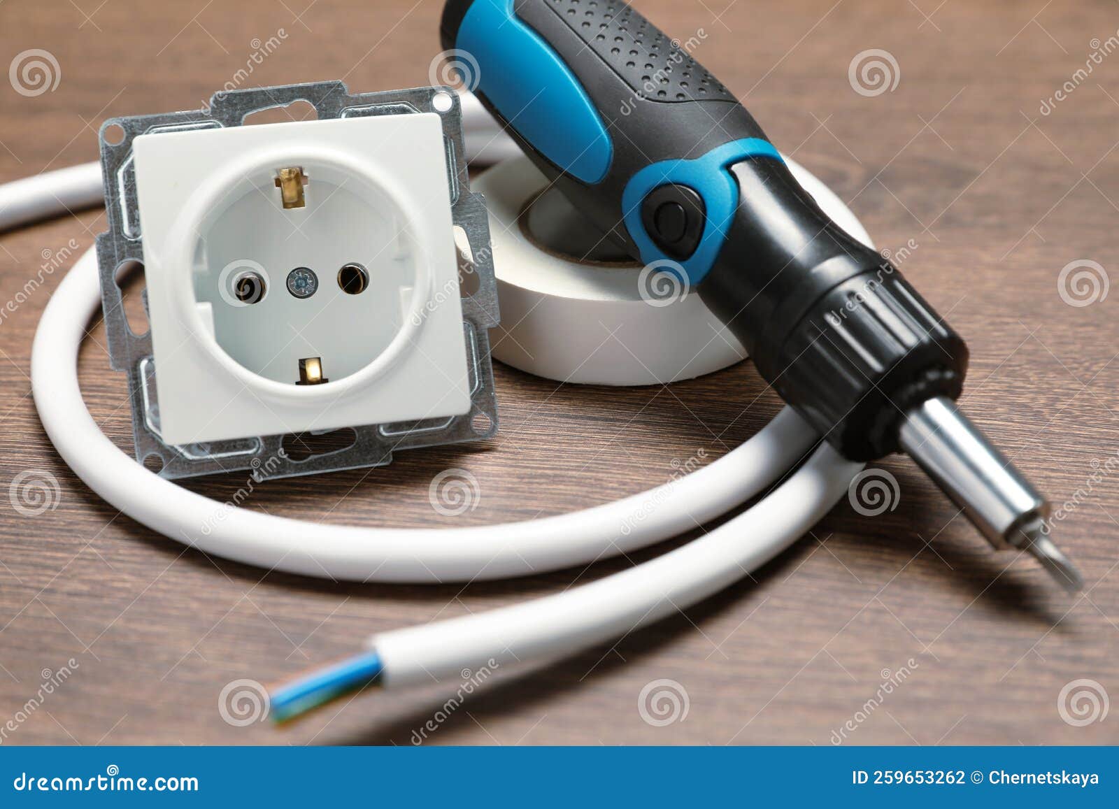 Screwdriver, Cable, Insulating Tape and Power Socket on Wooden Table ...