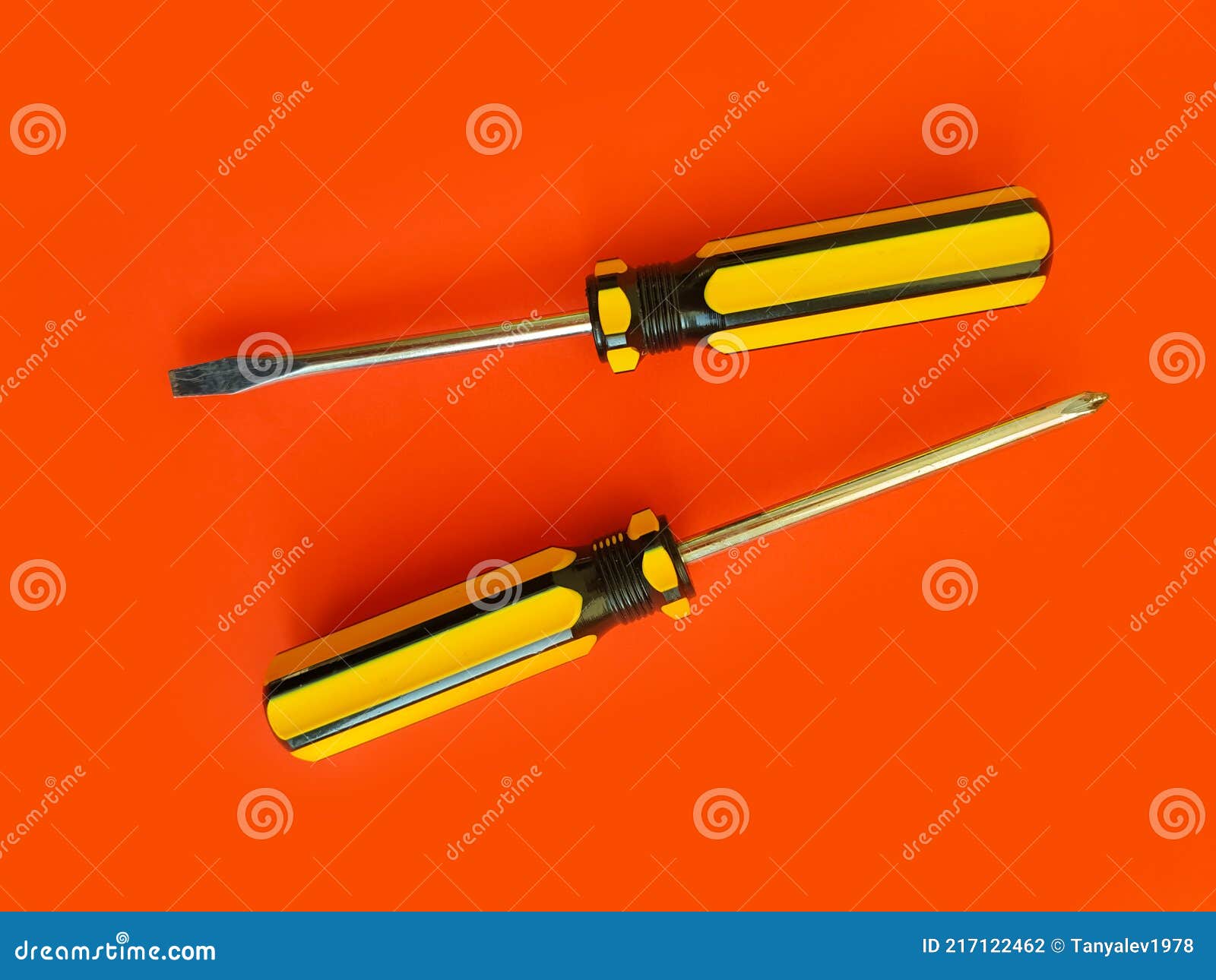 Screwdriver Worker on a Colored Background Construction Stainless Steel ...