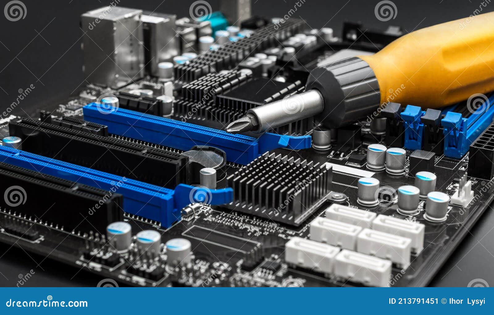 Screwdriver on Computer Motherboard. Computer Service Concept Stock ...