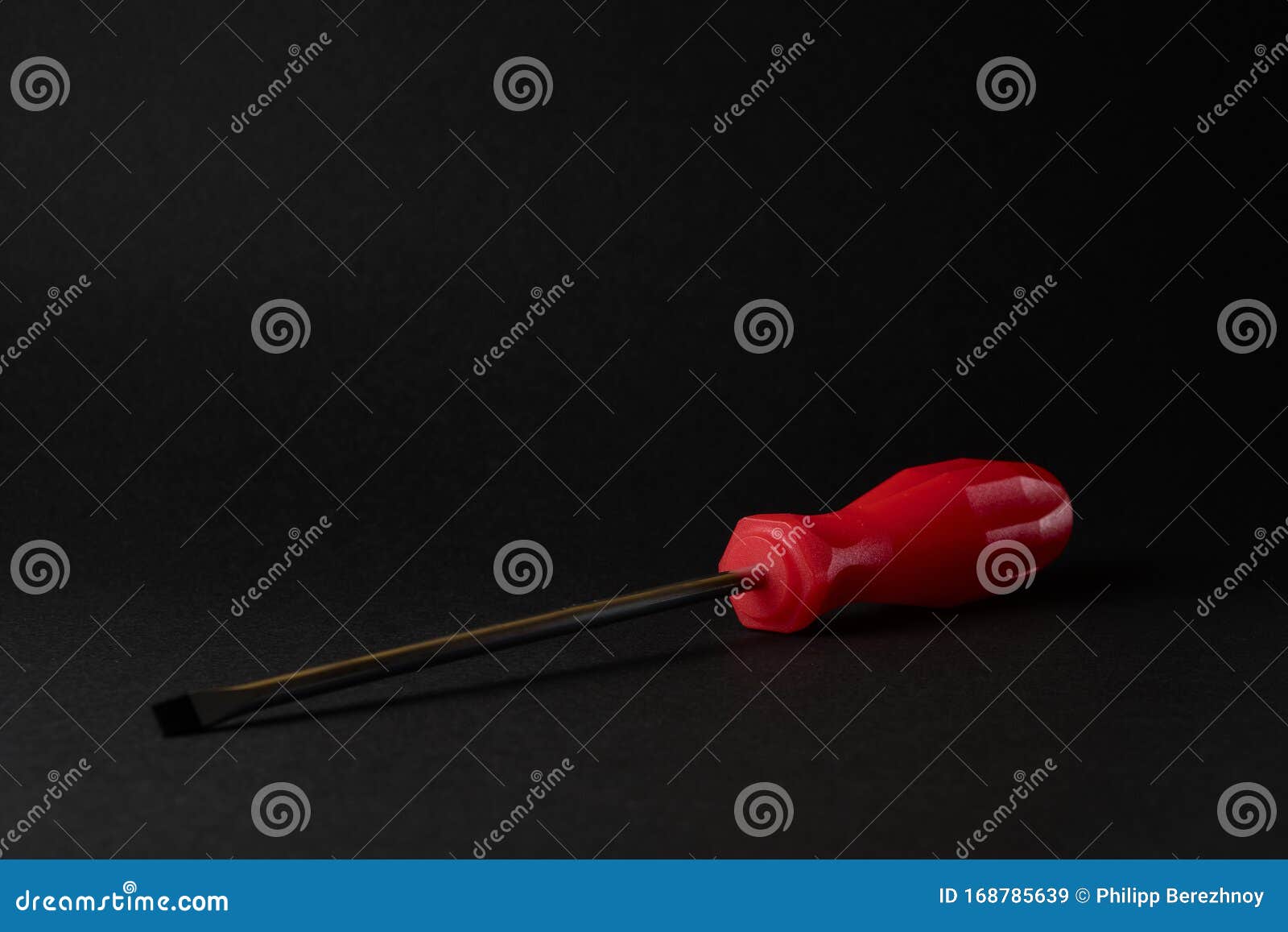 Screwdriver with Red Handle on Black Background Stock Image - Image of ...