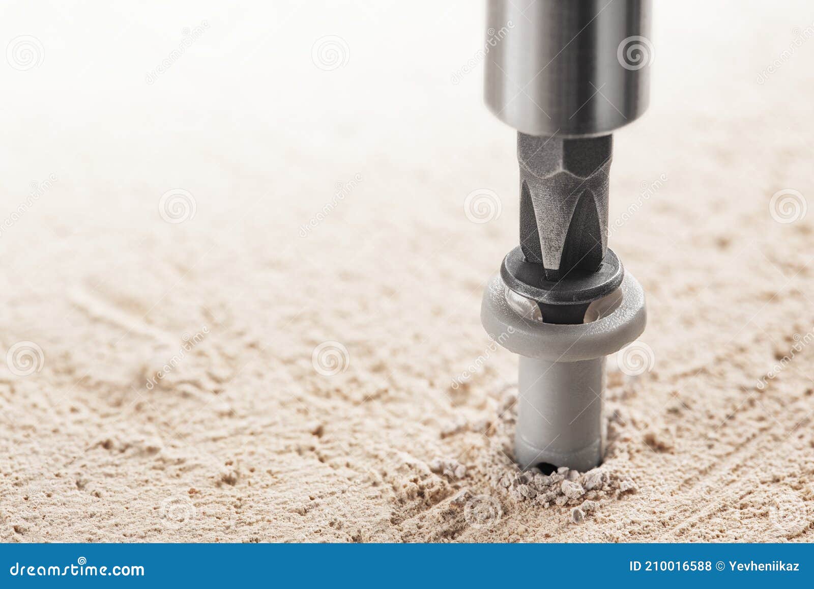 Screwdriver and Dowel in a Concrete Wall Background Stock Photo - Image ...