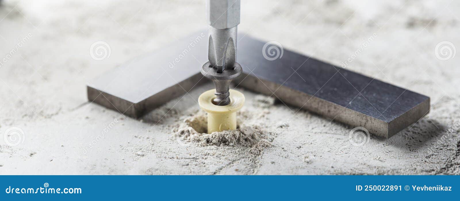 Screwdriver and Dowel in a Concrete Wall Background Stock Image - Image ...