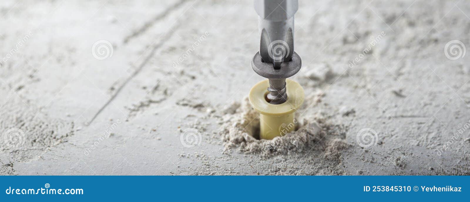 Screwdriver and Dowel in a Concrete Wall Background Stock Photo - Image ...