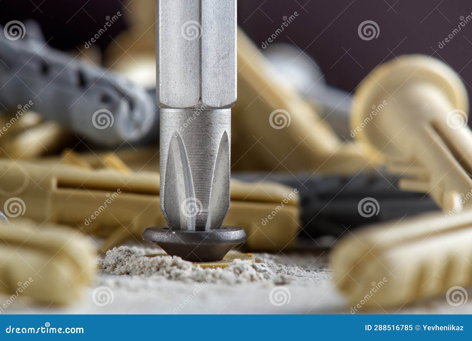 Screwdriver and Dowel in a Concrete Wall Background Stock Image - Image ...
