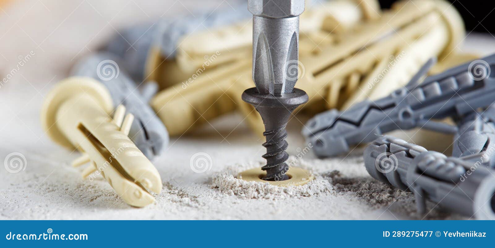 Screwdriver and Dowel in a Concrete Wall Background Stock Image - Image ...