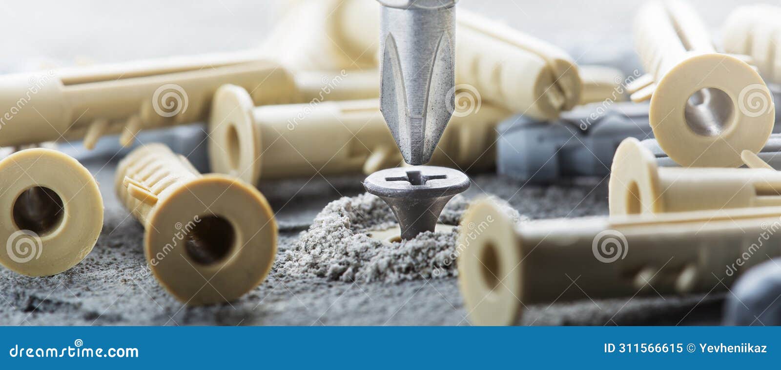 Screwdriver and Dowel in a Concrete Wall Background Stock Image - Image ...