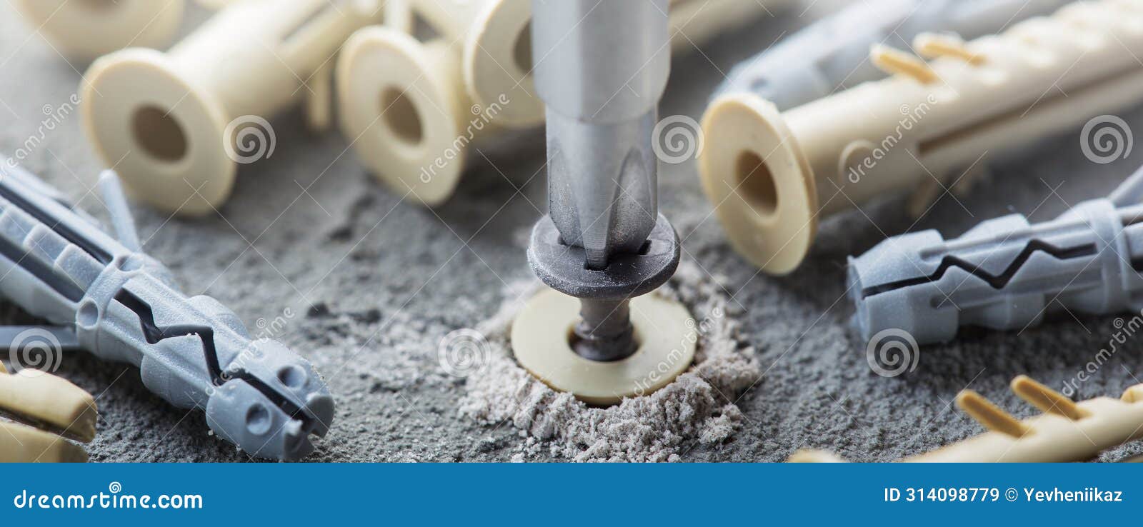 Screwdriver and Dowel in a Concrete Wall Background Stock Image - Image ...