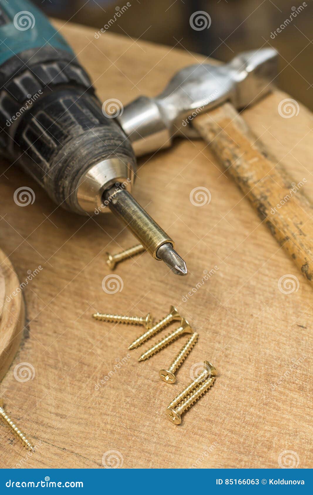 Screwdriver, Screws and a Hammer are on the Table. Stock Image - Image ...