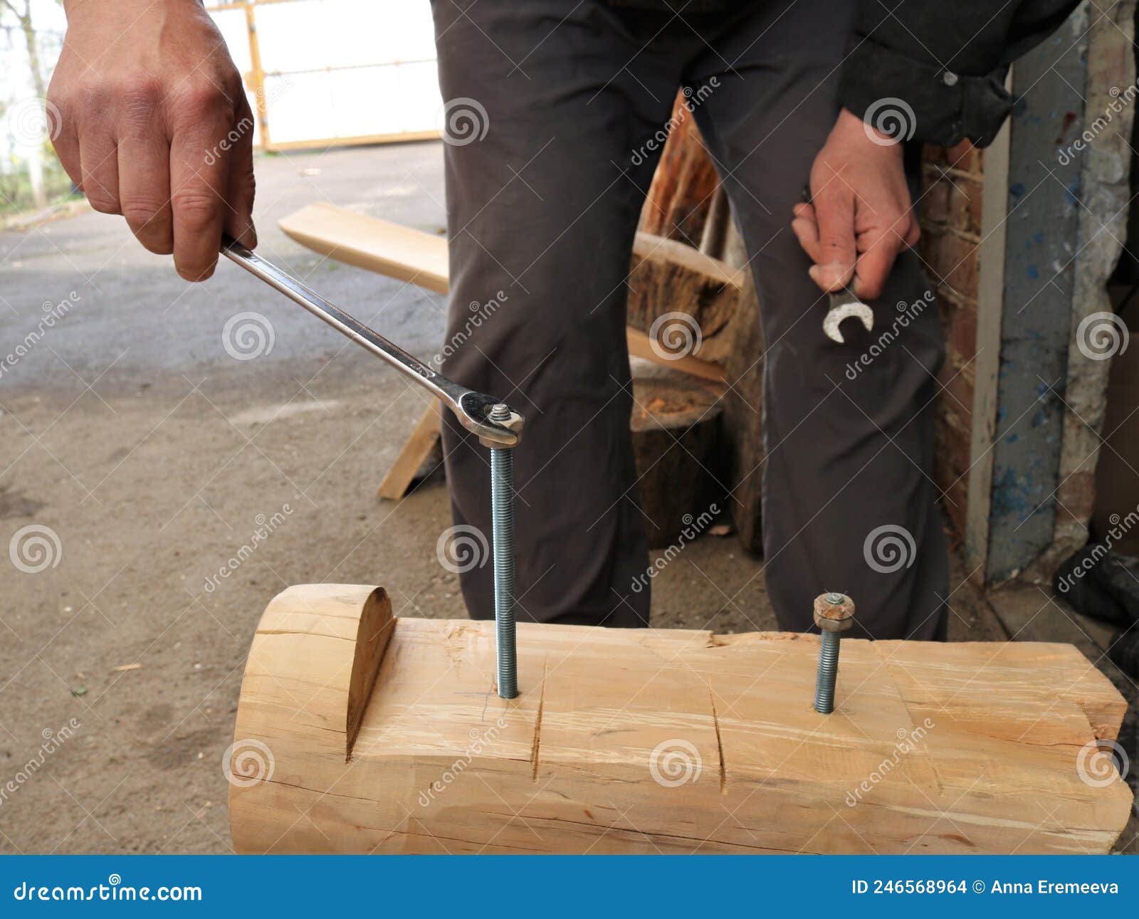 Screwing Nuts on the Threads of a Long Bolt Stock Photo - Image of long ...