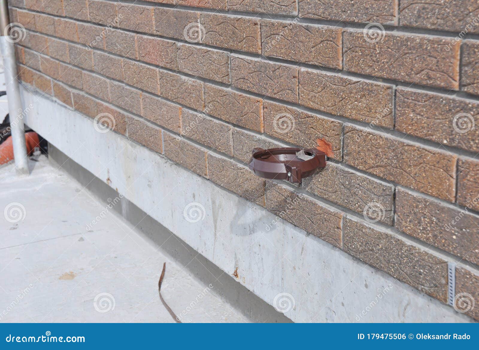 Screwing a Polypipe Round Downpipe Bracket, Pipe Clip To Fit a Rain ...