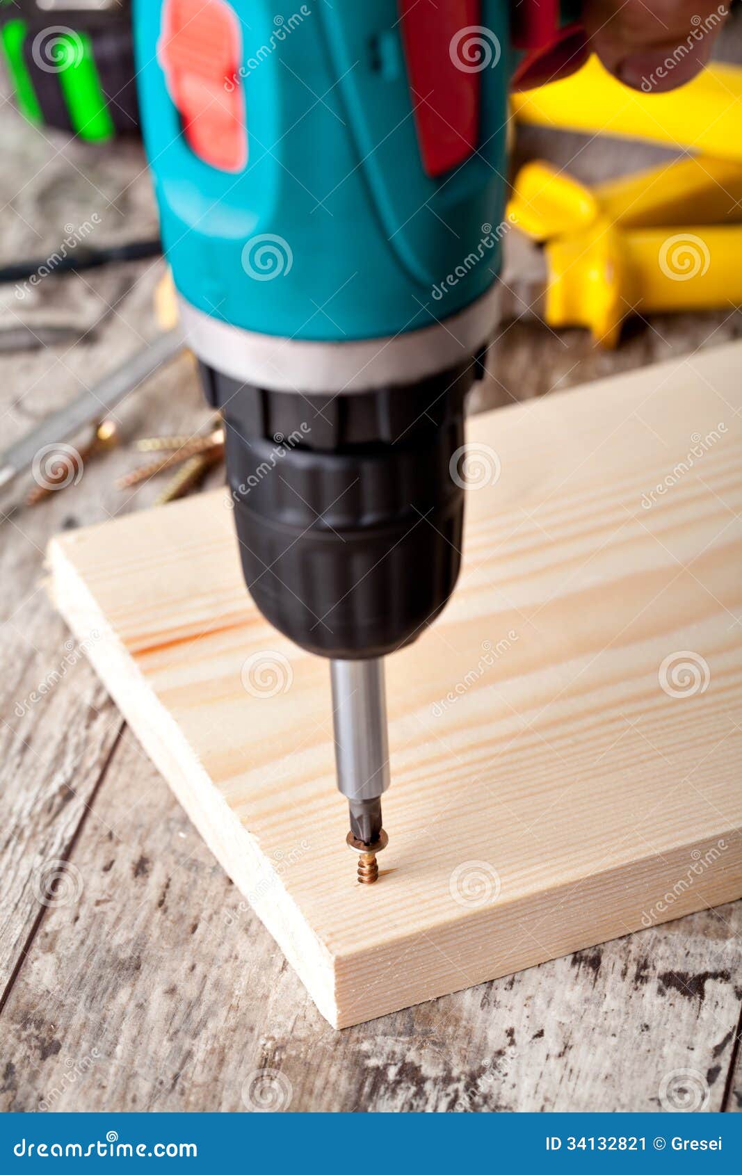 Screwing a stock image. Image of tool, working, wooden - 34132821