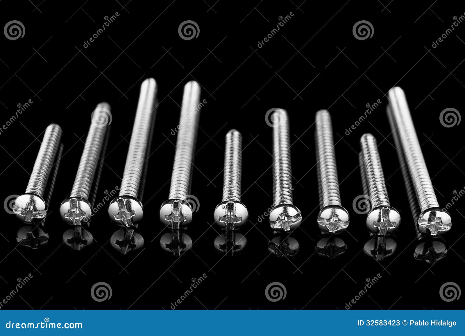 Screws on Black background stock image. Image of ironware - 32583423