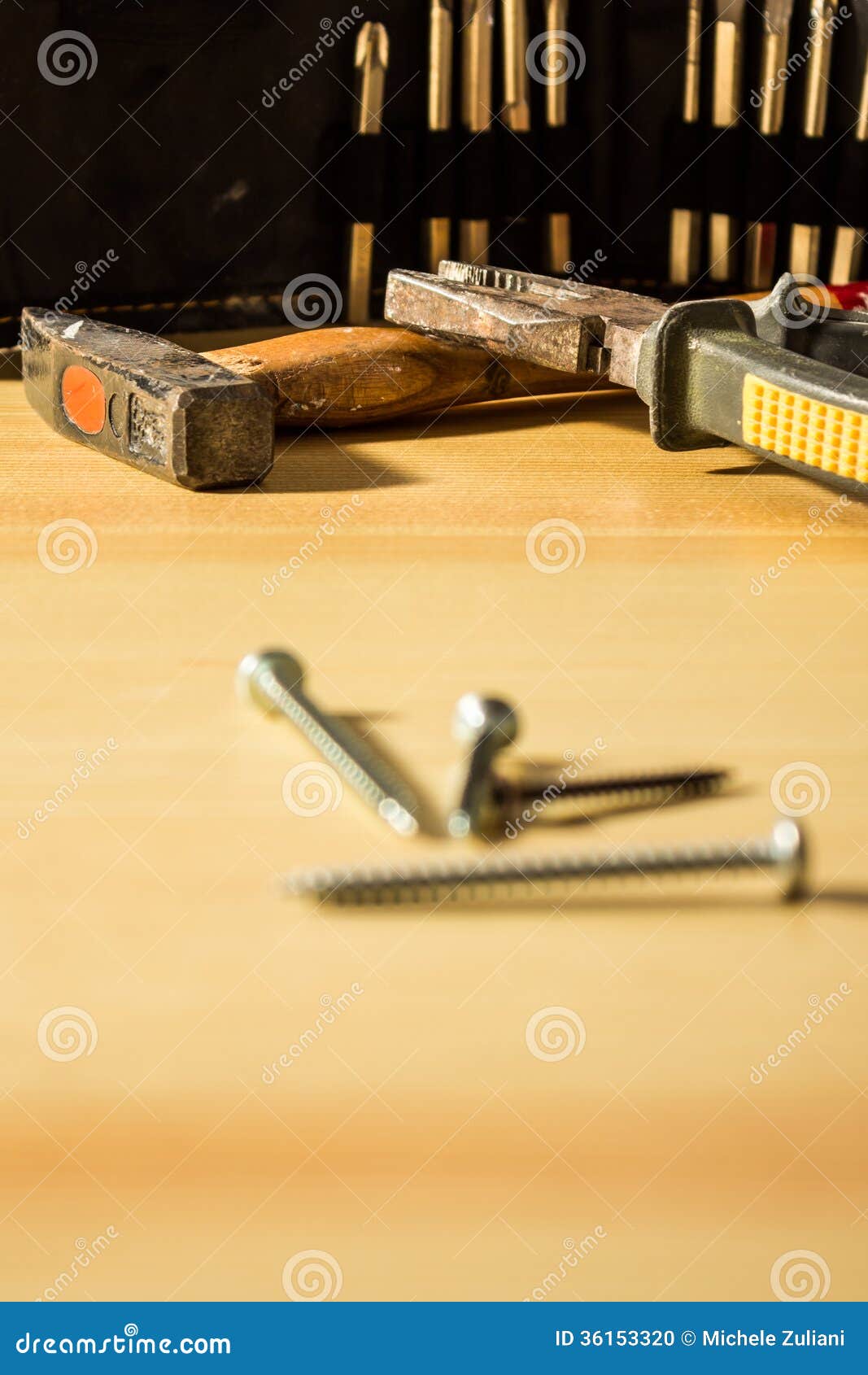 Screws and Hammer on a Table Stock Photo - Image of hardware ...