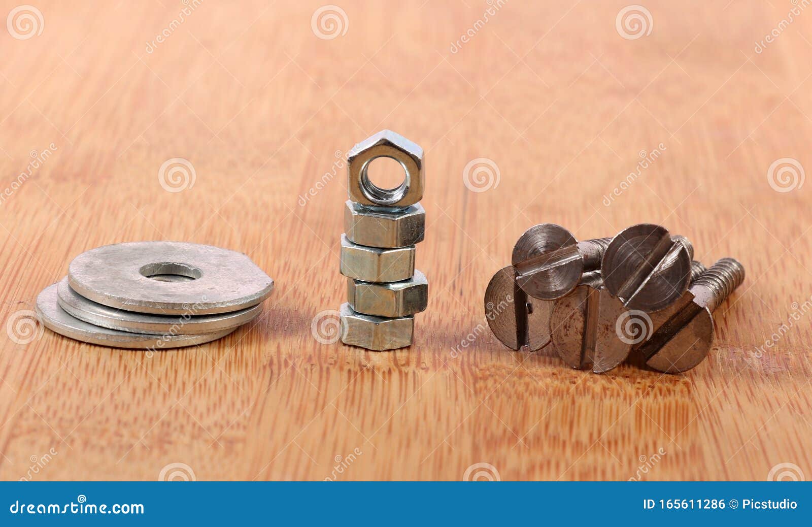 Screws and nuts stock photo. Image of shining, nuts - 165611286